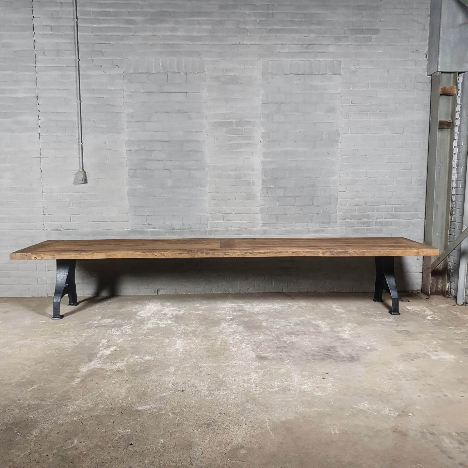 Long industrial design table with iron legs – thick oak tabletop