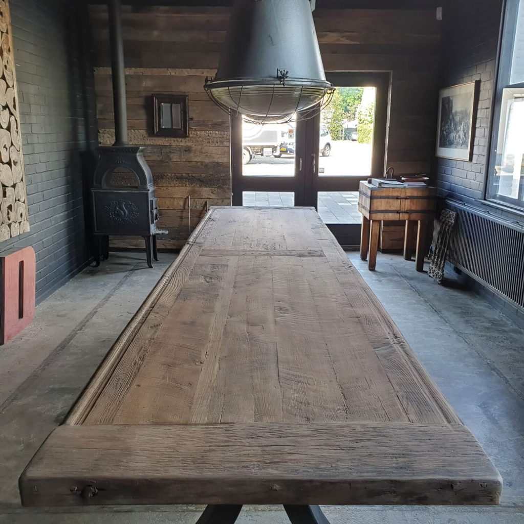 Long industrial design table with iron legs – thick oak tabletop