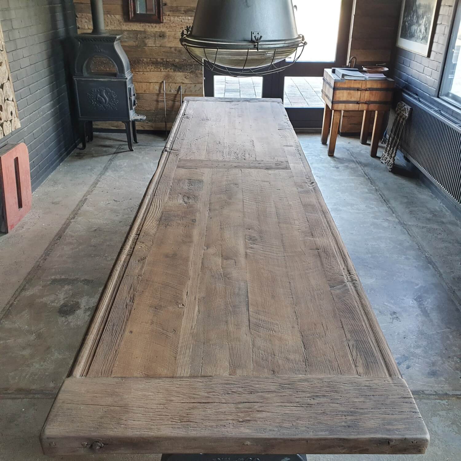 Long industrial design table with iron legs – thick oak tabletop